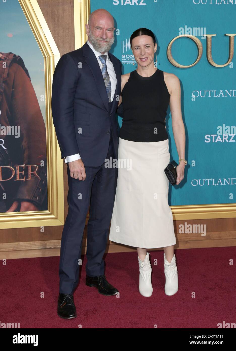 Hollywood, USA. 13th Feb, 2020. Graham McTavish, Garance Dore walking ...