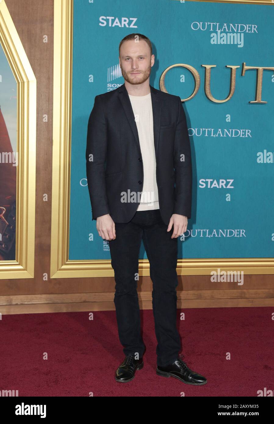 Hollywood, USA. 13th Feb, 2020. Yan Tual walking the red carpet at the ...