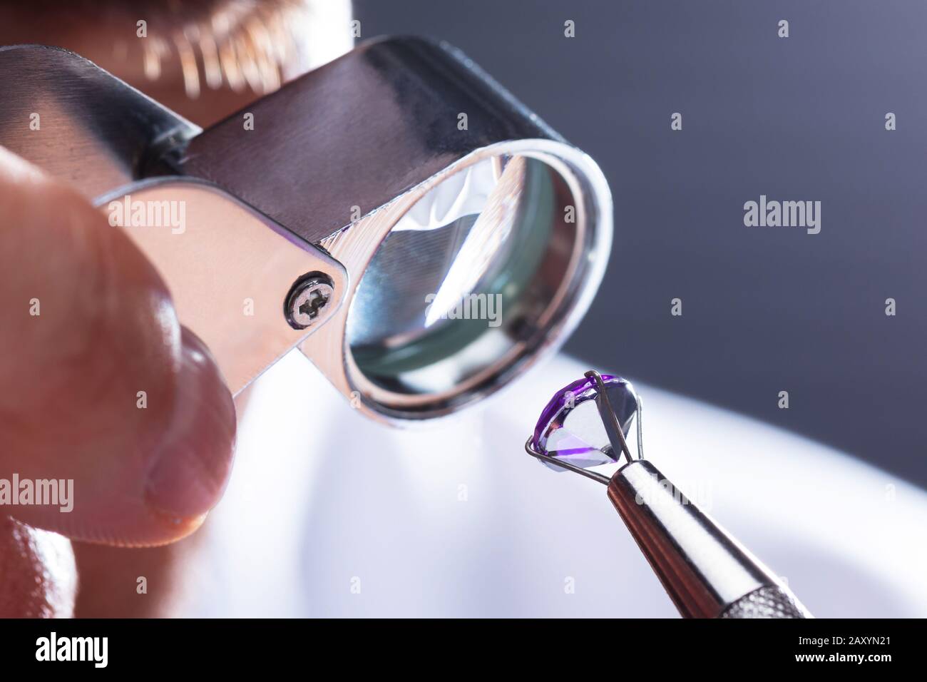 Jewelry loupe diamond ring hi-res stock photography and images - Alamy