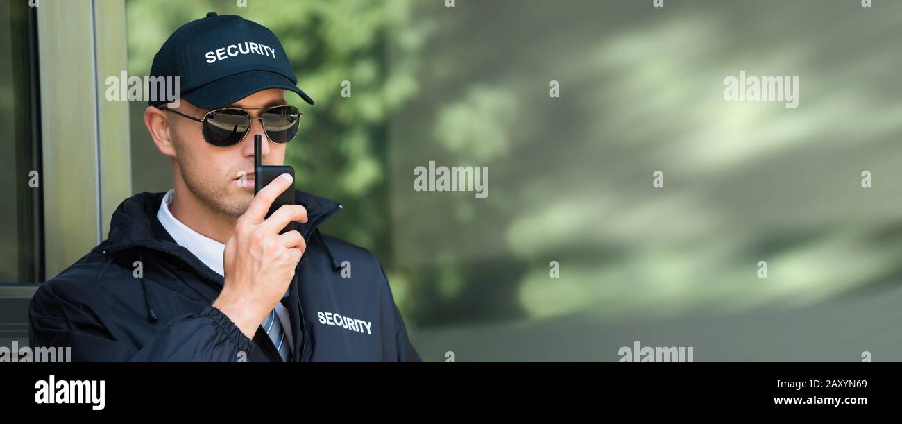 Security Guard Talking Walkie Talkie High Resolution Stock Photography ...
