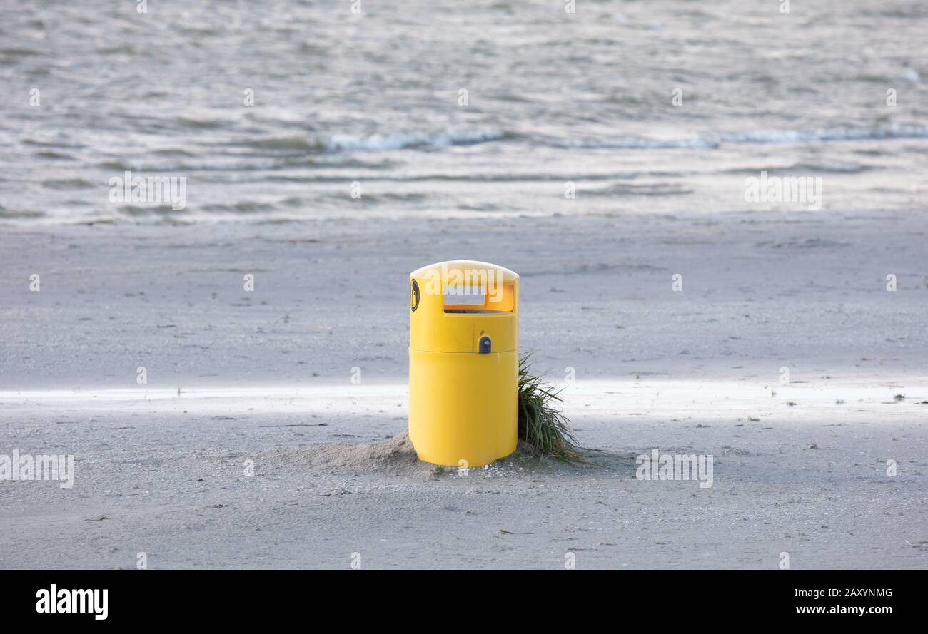 Waste bin on a sandy beach in the Netherlands Stock Photo - Alamy