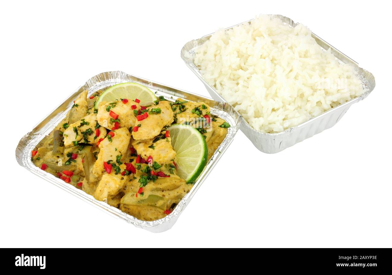 Thai green chicken curry take away meal in foil container isolated on a ...