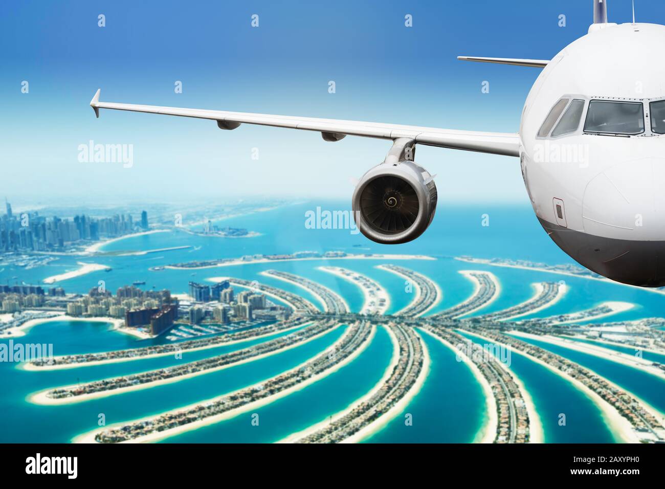Airplane flying island hi-res stock photography and images - Alamy