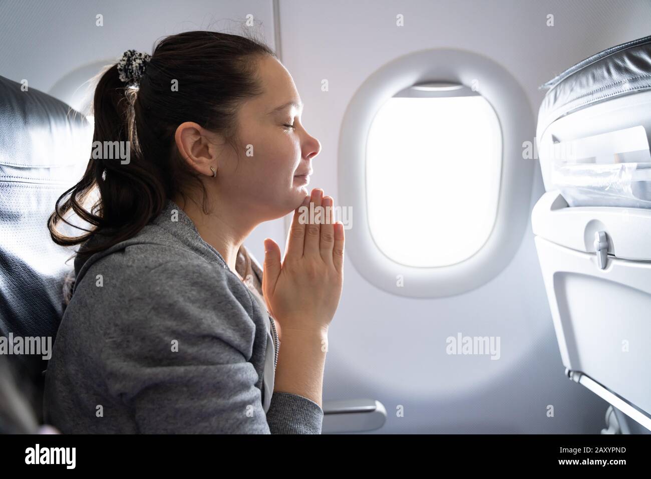 Woman scared plane hi-res stock photography and images - Alamy
