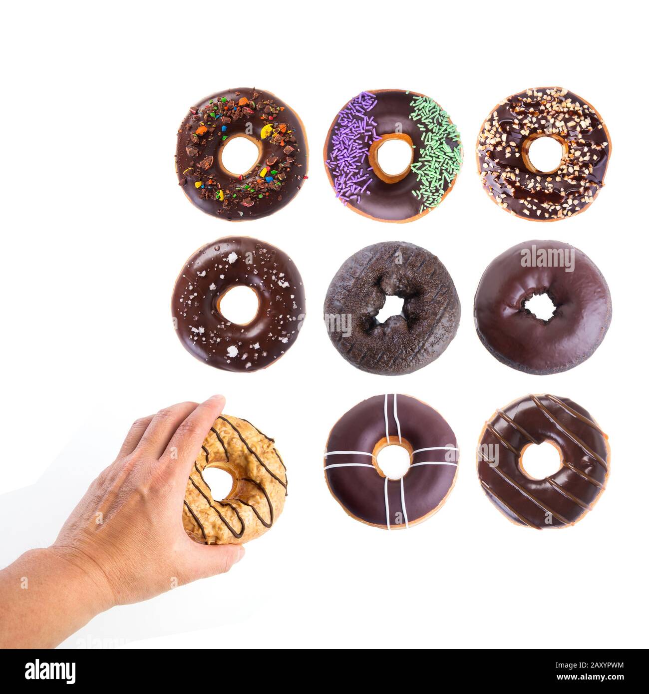 Donut or Donuts with hand on a background new Stock Photo - Alamy