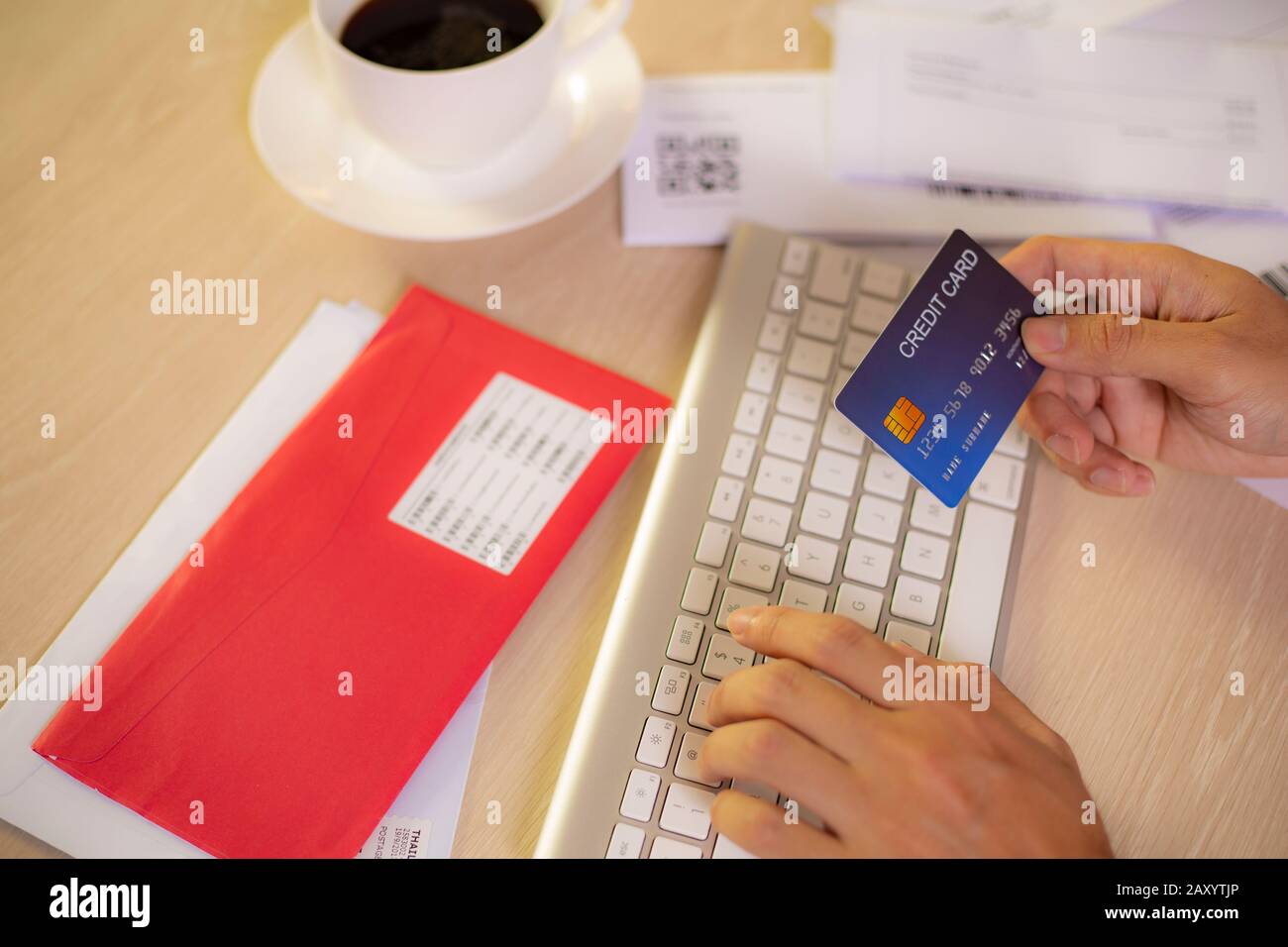 using credit card for bill payment option Stock Photo - Alamy