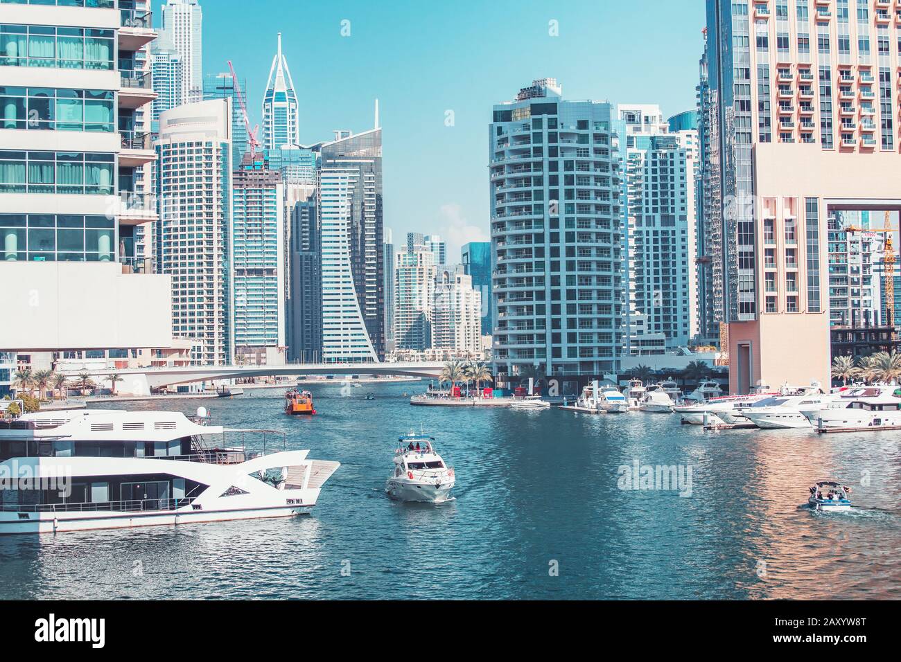 Luxury yacht boat sailing in Dubai Marina harbor Stock Photo - Alamy