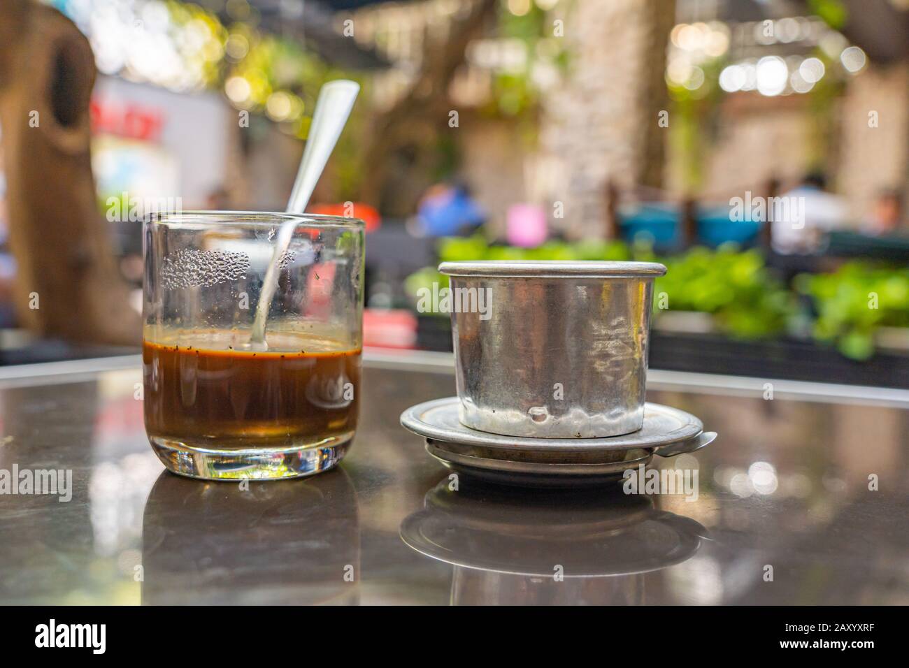 Vietnamese traditional morning drink- fin coffee mixed with milk Stock ...