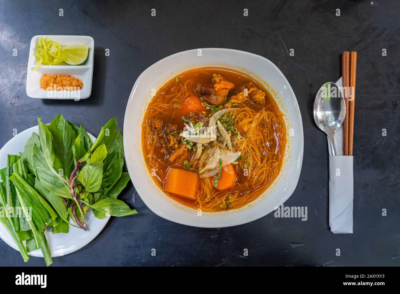 Delicious Vietnamese stewed beef brisket rice noodles on black ...