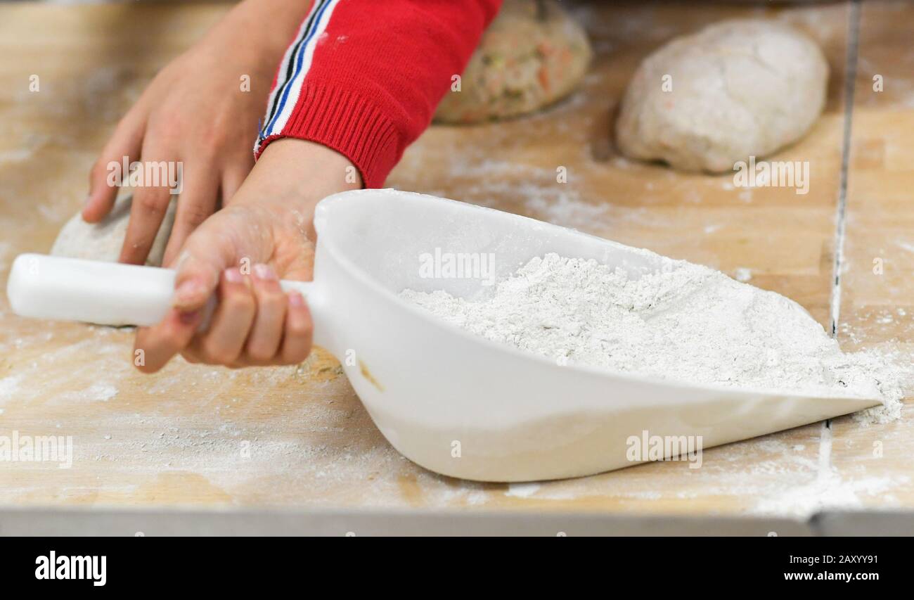 Berlin, Germany. 13th Feb, 2020. Primary school children bake their own ...