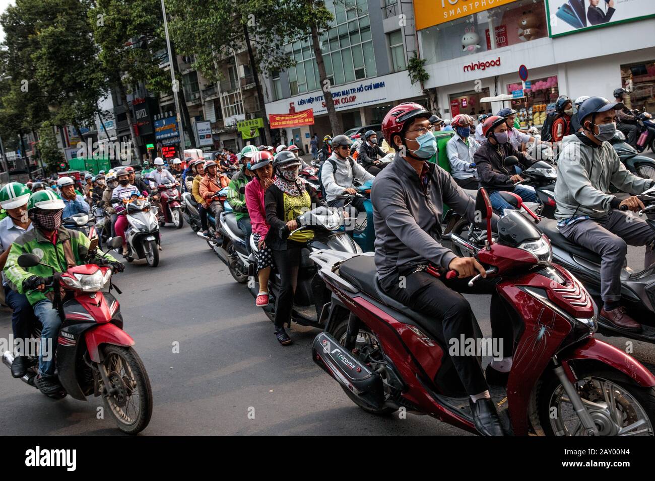 Motorcyclists sit in a big traffic queue in Ho Chi Minh City, Vietnam ...