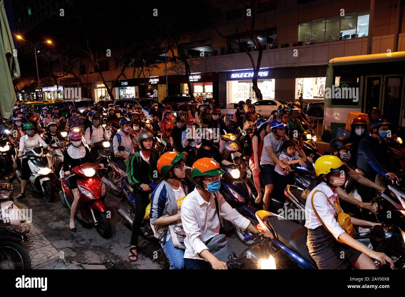 Motorcyclists sit in a big traffic queue in Ho Chi Minh City, Vietnam ...