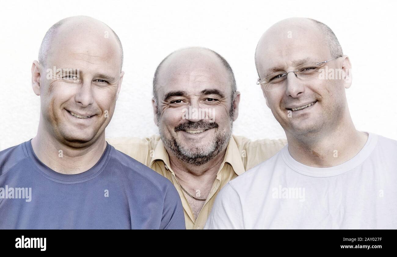 3 bald heads Stock Photo - Alamy