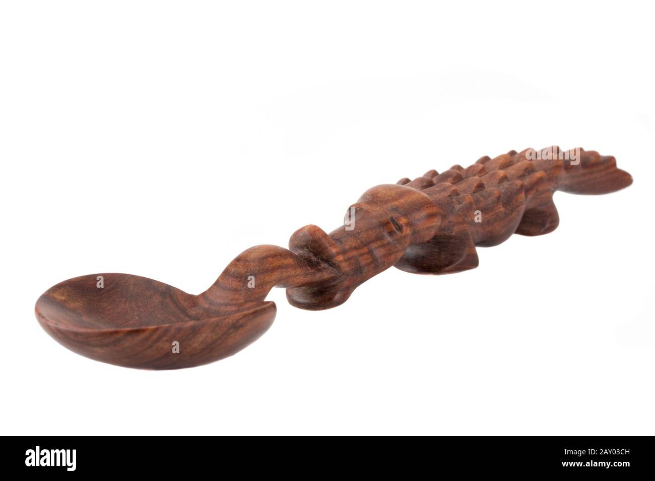carved wooden spoon in the shape of a crocodile Stock Photo - Alamy