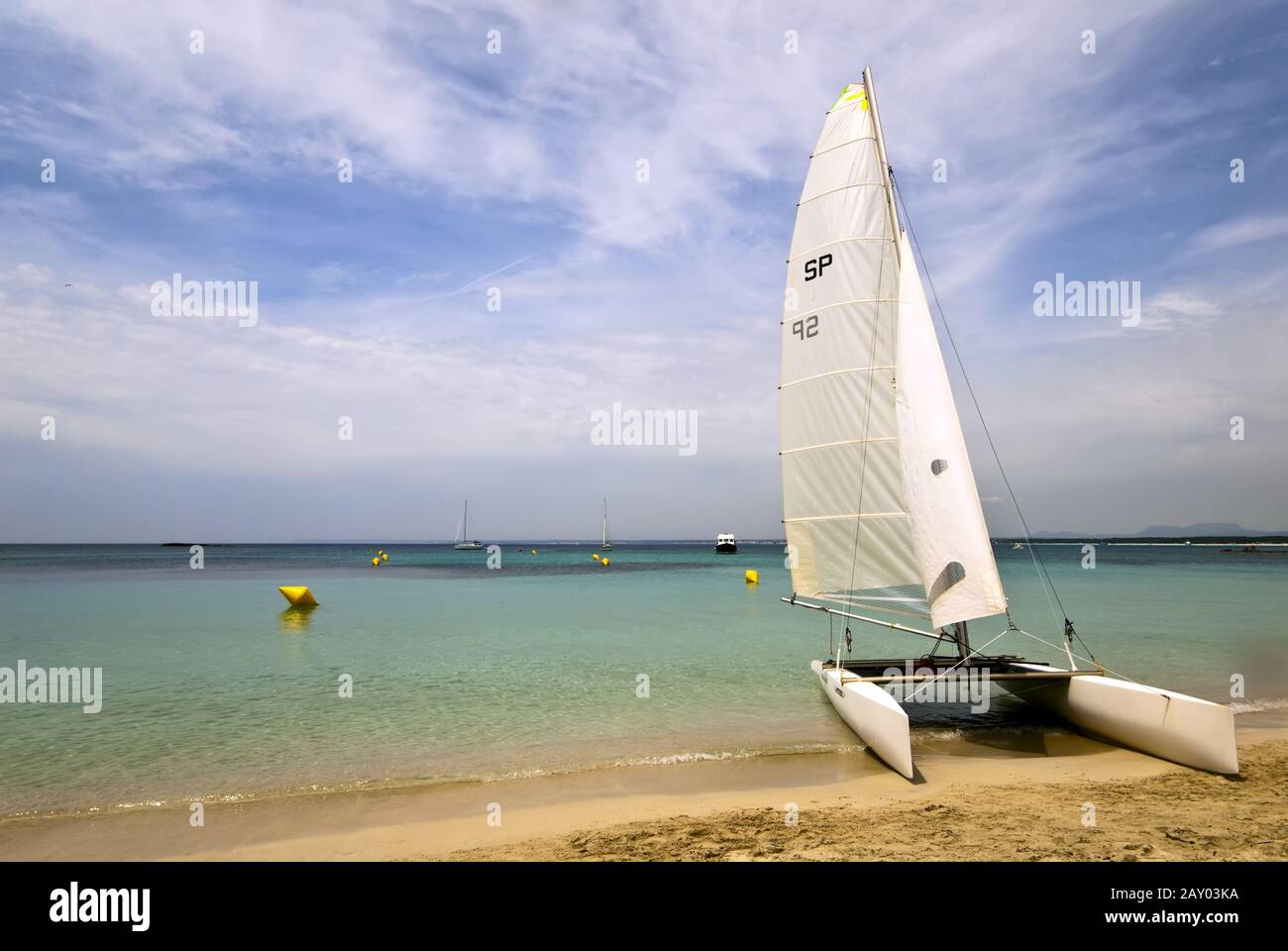 Catamaran on the beach Stock Photo - Alamy
