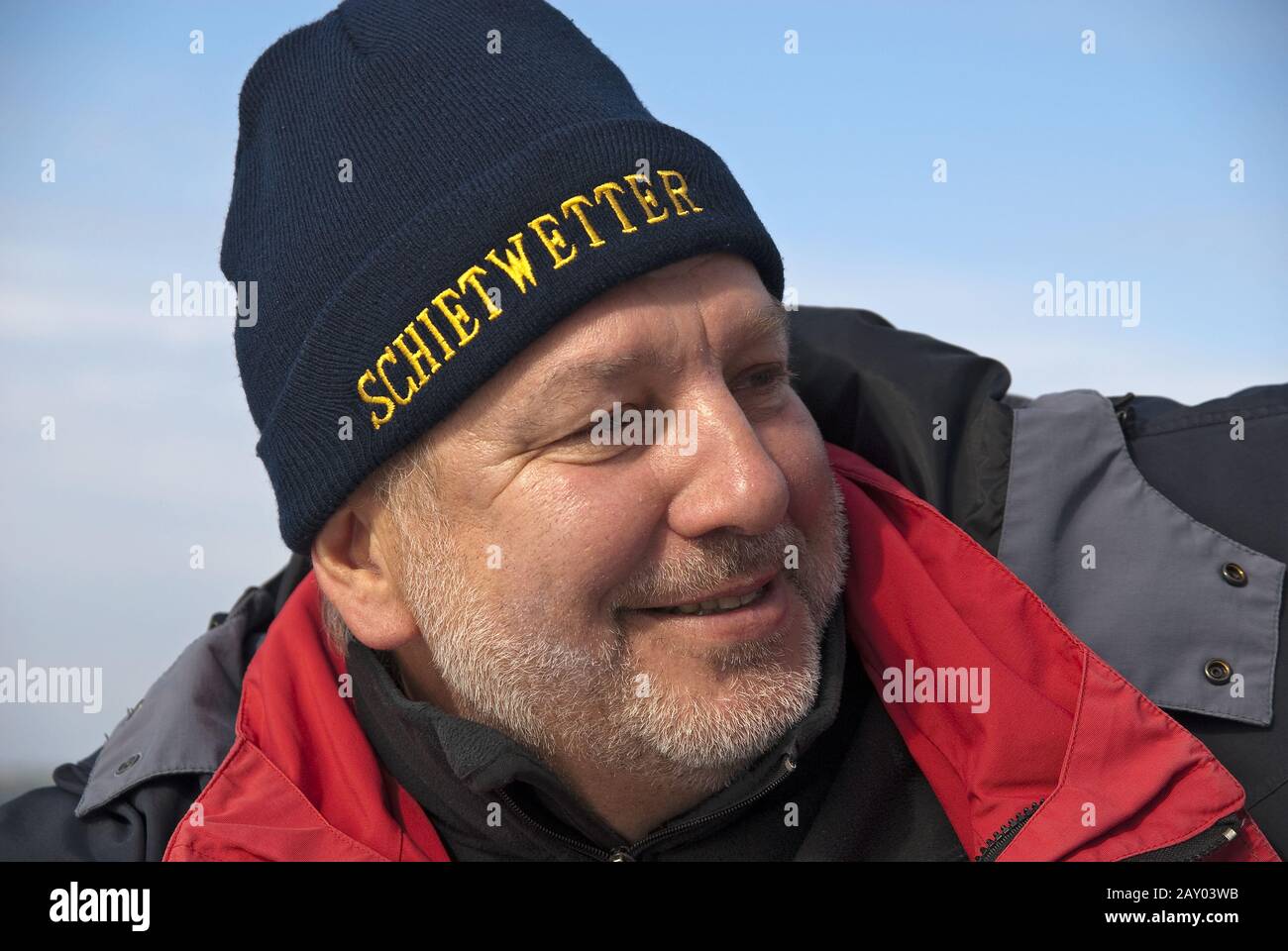 Skipper with bobble cap Stock Photo - Alamy