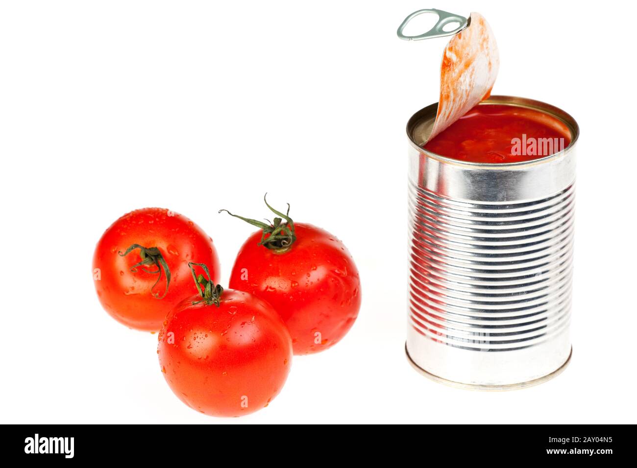 Tin with tomatoes Stock Photo - Alamy