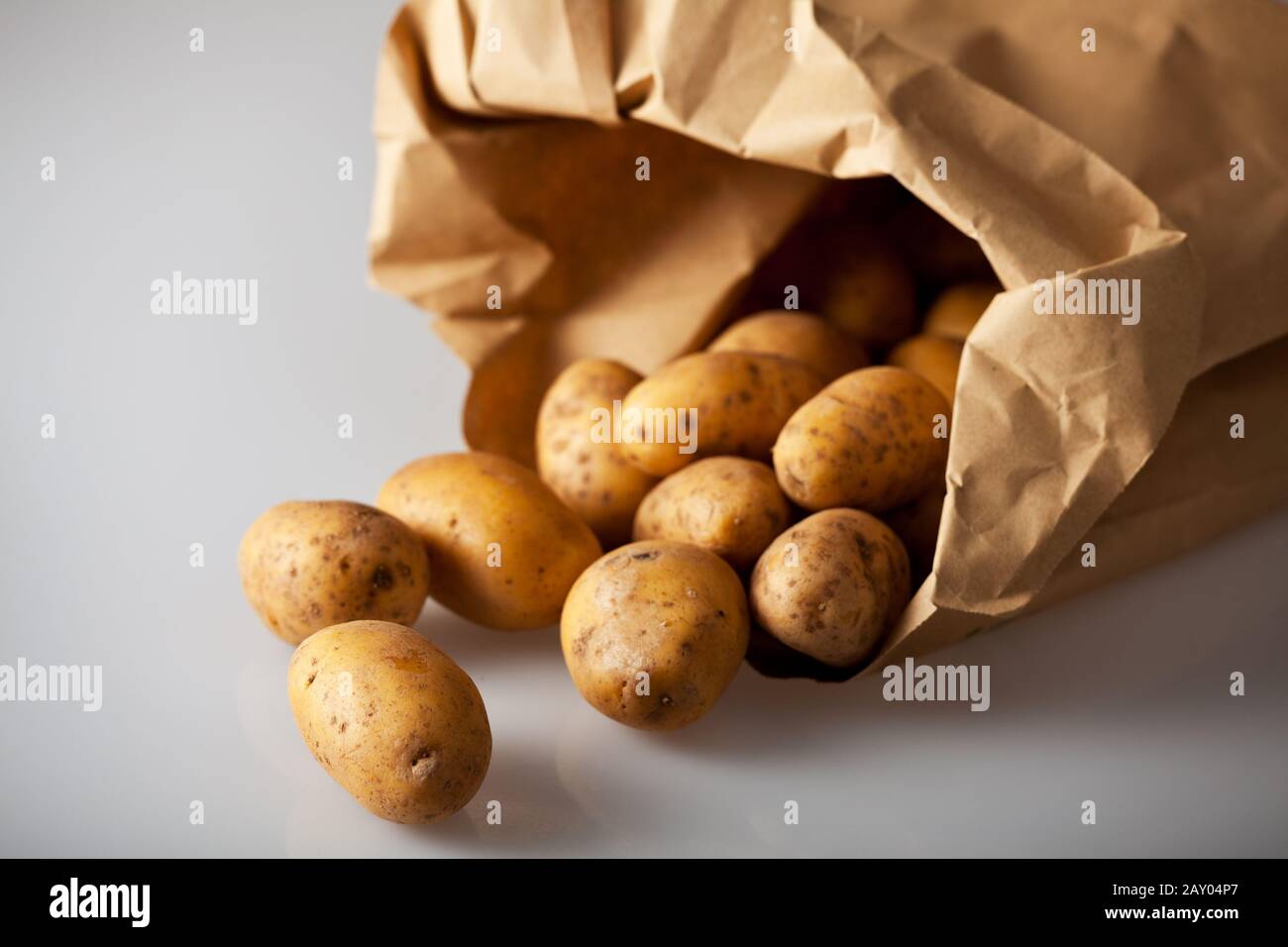 Potatoes in brown paper bag hi-res stock photography and images - Alamy