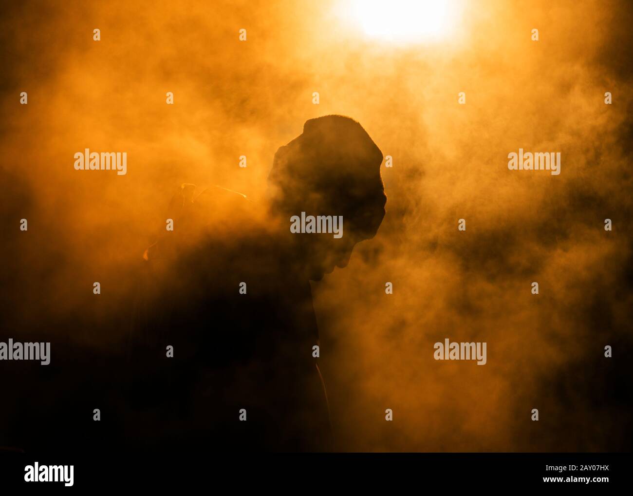 Man in smoke hi-res stock photography and images - Alamy