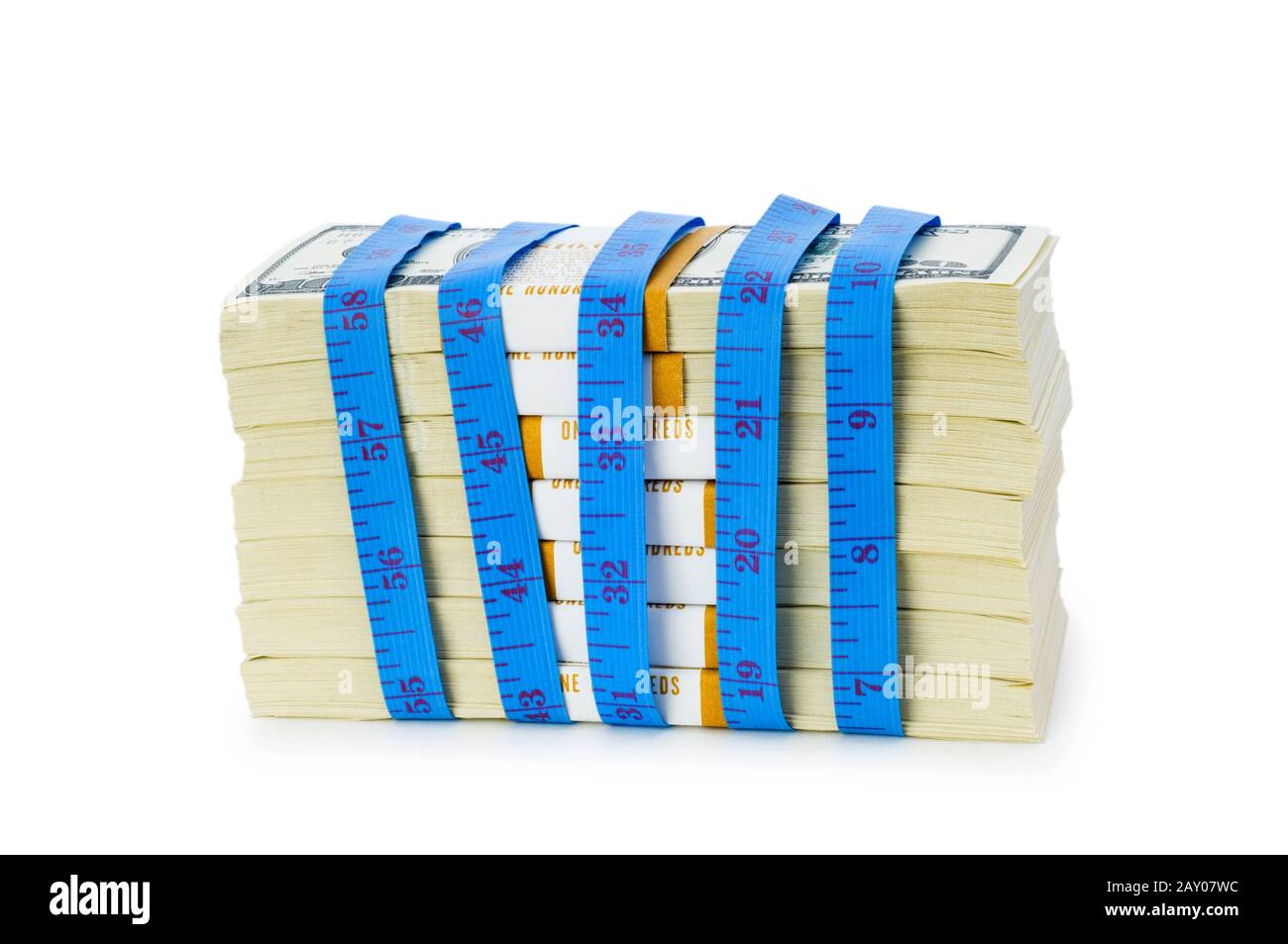 Financial concept - measuring money isolated on white Stock Photo - Alamy