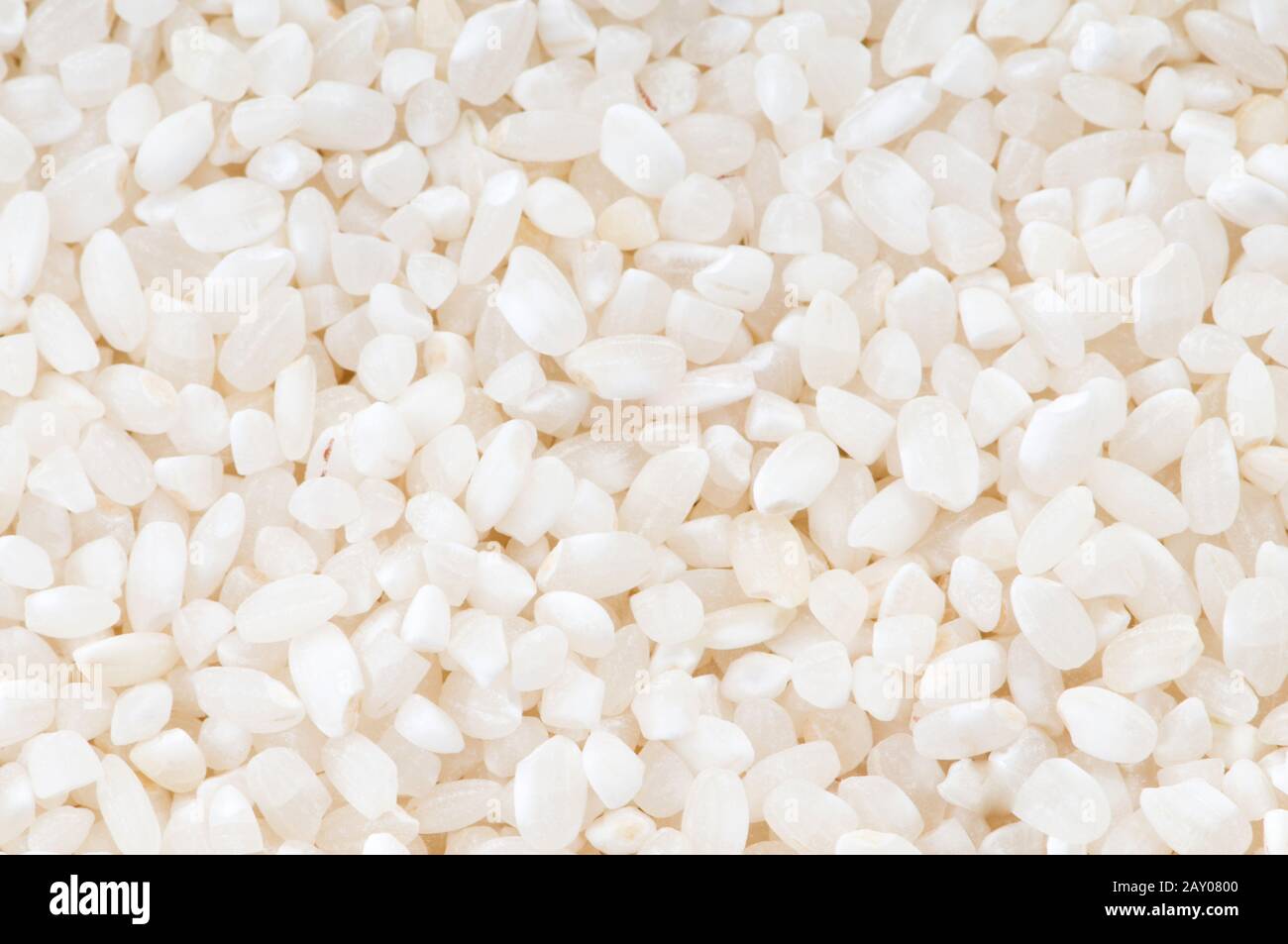 Extreme close up of white rice background Stock Photo - Alamy
