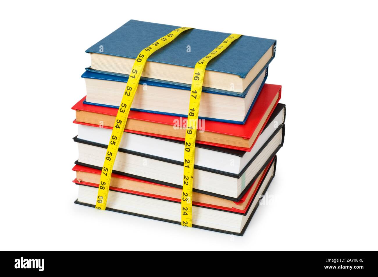 Measuring the knowledge - concept with books on white Stock Photo - Alamy