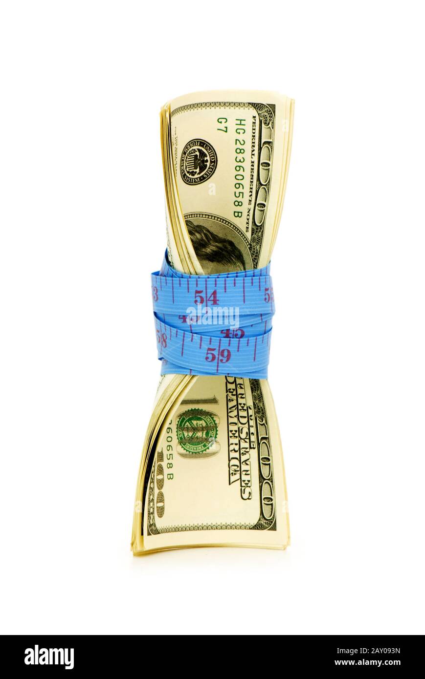 Financial concept - measuring money on white Stock Photo - Alamy