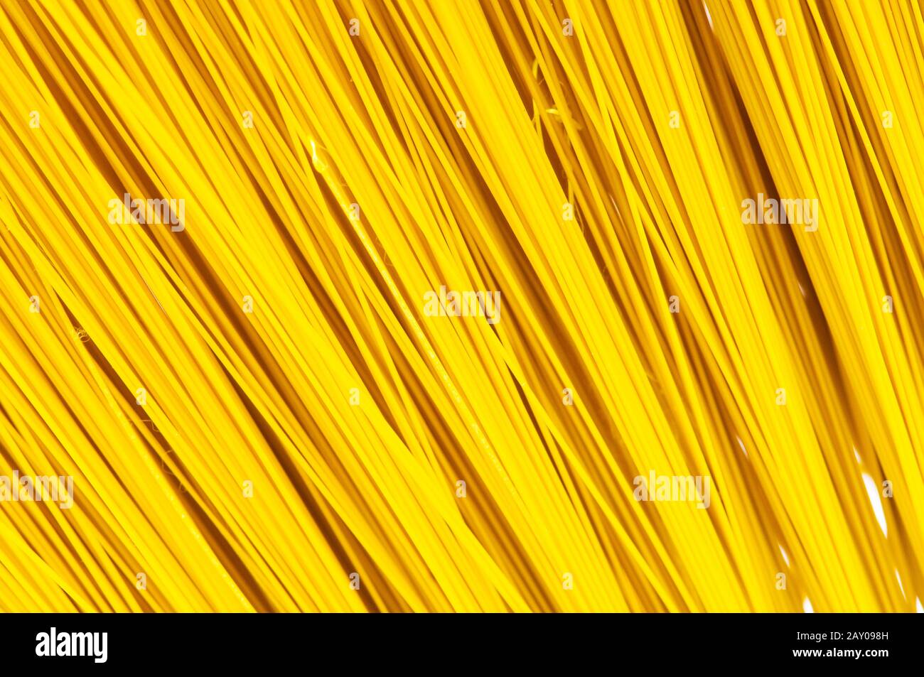 Long spaghetti arranged at background Stock Photo - Alamy