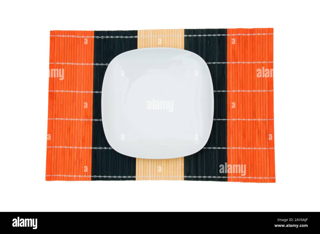 Set of plate and mat isolated on white Stock Photo - Alamy