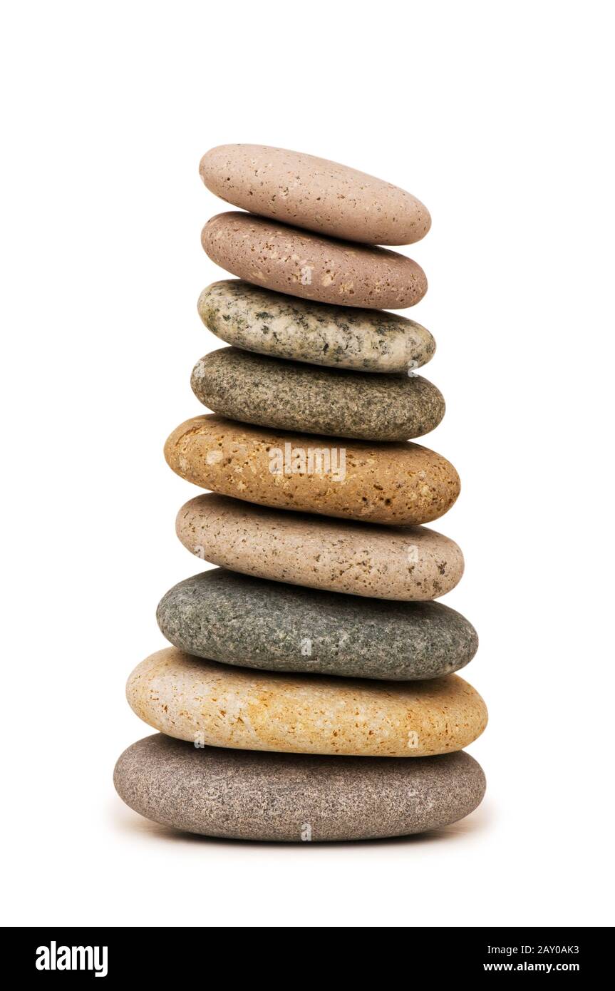 Stack of pebbles isolated on the white background Stock Photo - Alamy