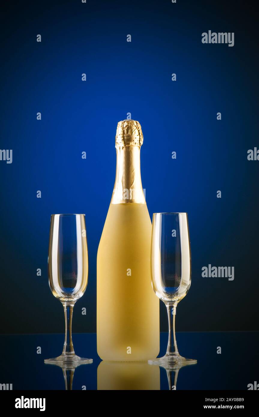 Champagne against color gradient background Stock Photo - Alamy