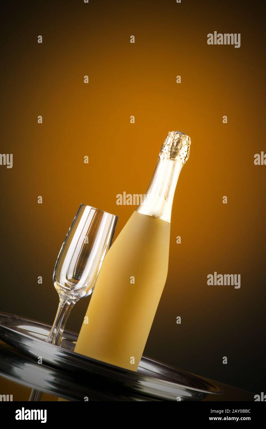 Champagne against color gradient background Stock Photo - Alamy