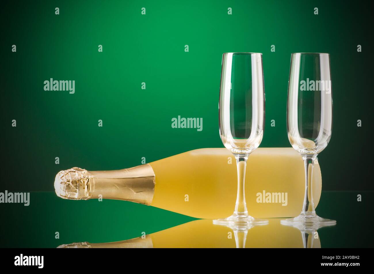 Champagne against color gradient background Stock Photo - Alamy