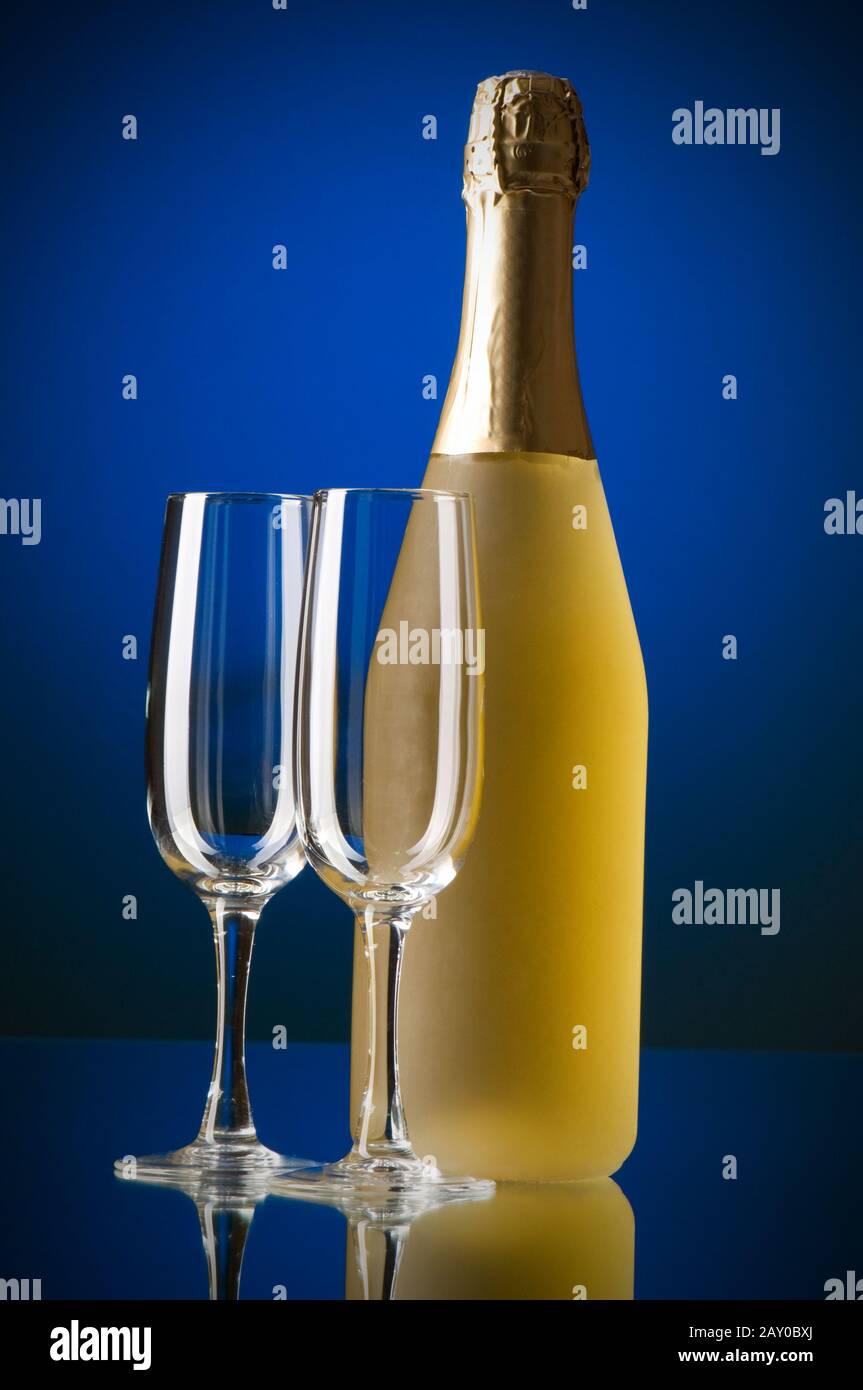 Champagne against color gradient background Stock Photo - Alamy
