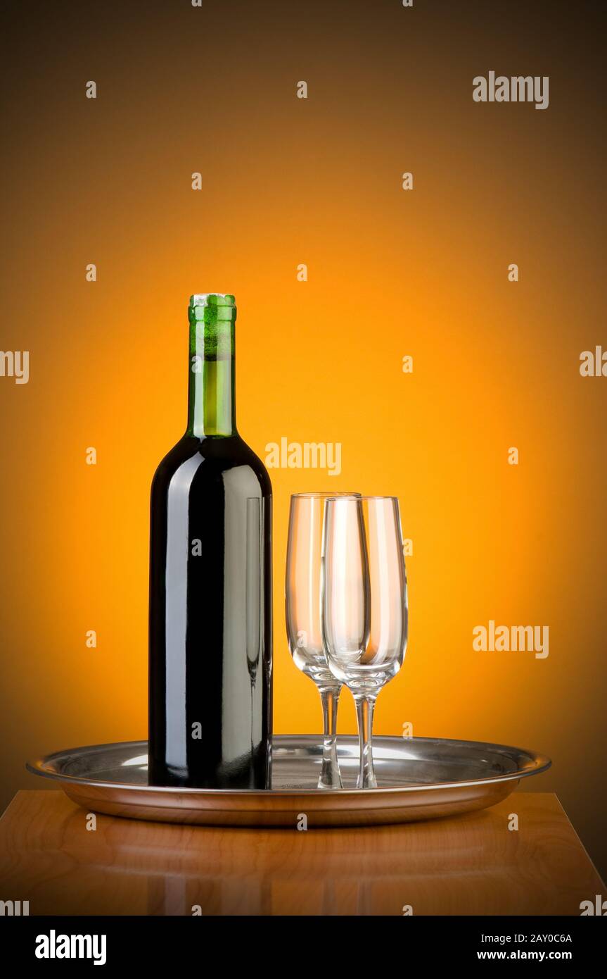 Wine against colour gradient background Stock Photo - Alamy