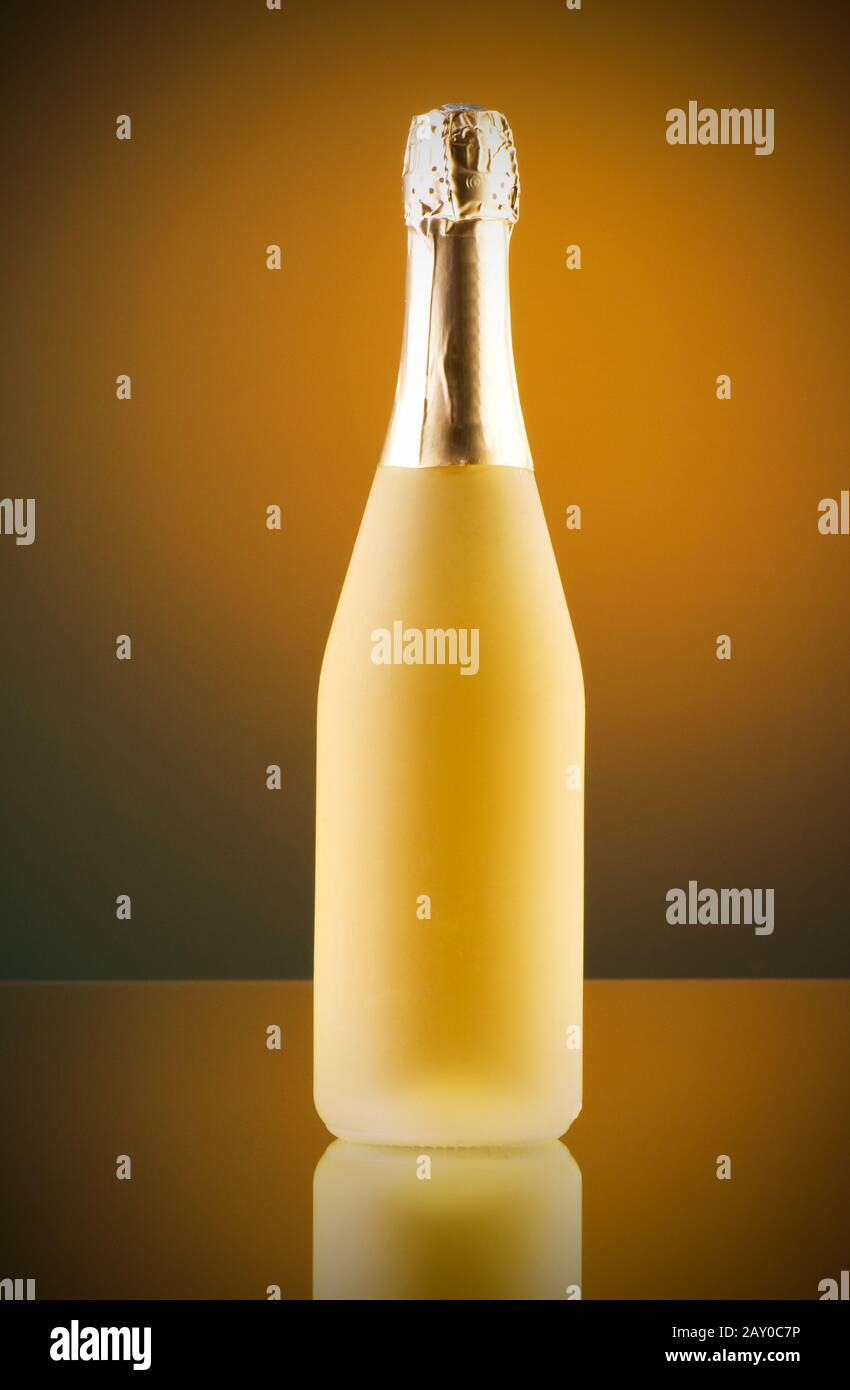 Champagne against color gradient background Stock Photo - Alamy