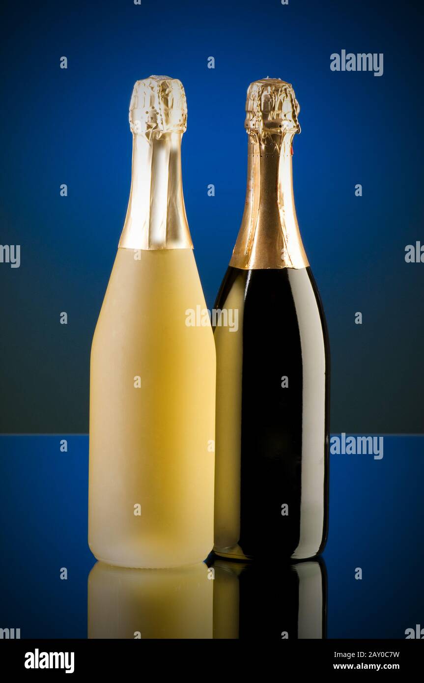 Champagne against color gradient background Stock Photo - Alamy