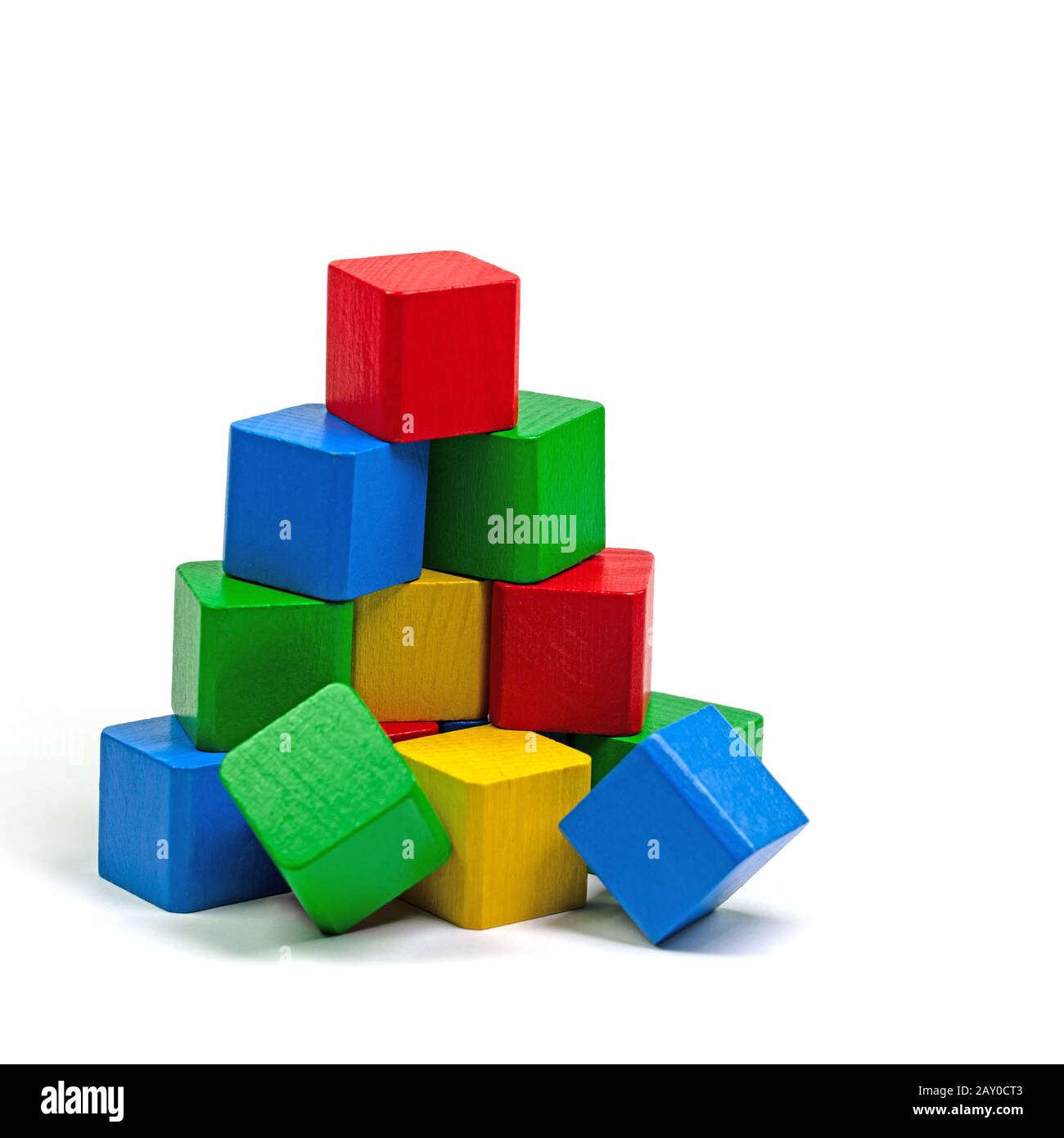 Colorful wooden toy blocks against white background Stock Photo - Alamy
