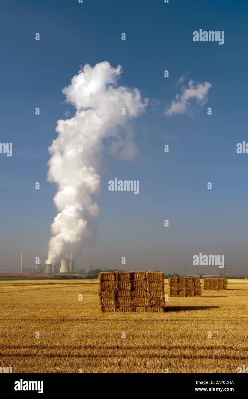 Straw stack and power plant Stock Photo - Alamy