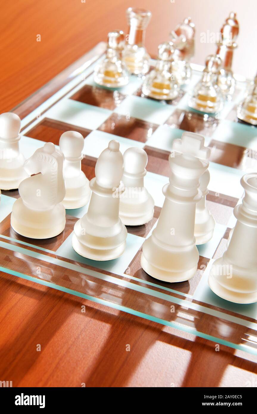 Set of chess figures on the playing board Stock Photo - Alamy