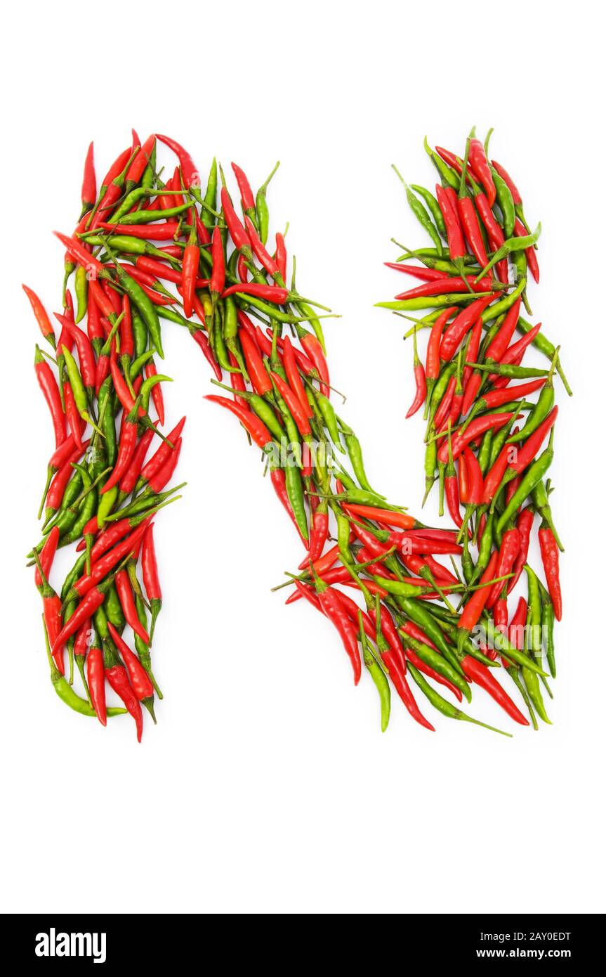 Alphabet with green and red peppers - letter Stock Photo - Alamy