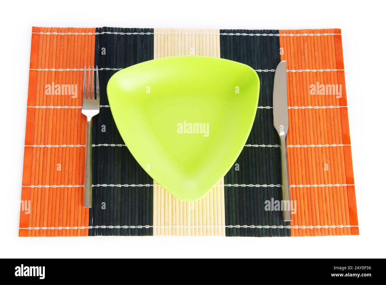 Plate with utensils isolated on the white Stock Photo - Alamy