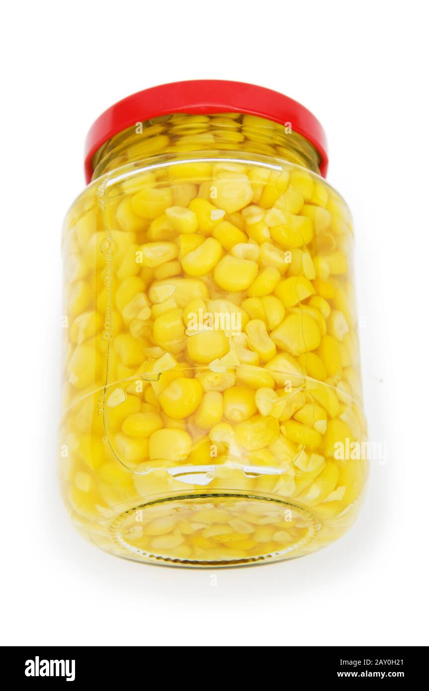 Sweet corn in glass jar isolated on white Stock Photo - Alamy