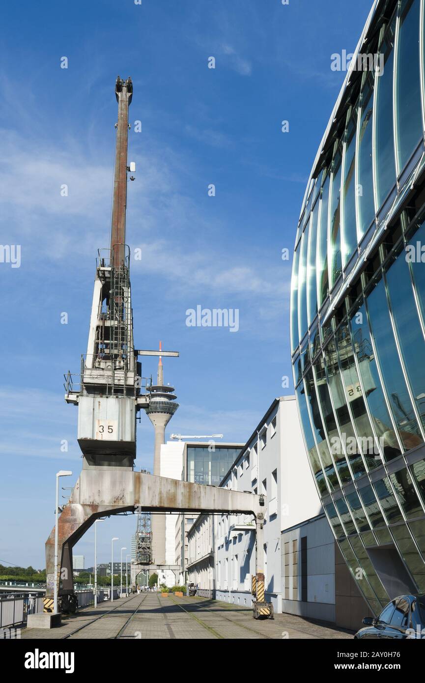 Crane with mirror image Stock Photo - Alamy