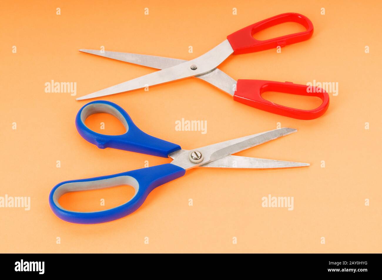 Colorful scissors on the color paper background Stock Photo - Alamy