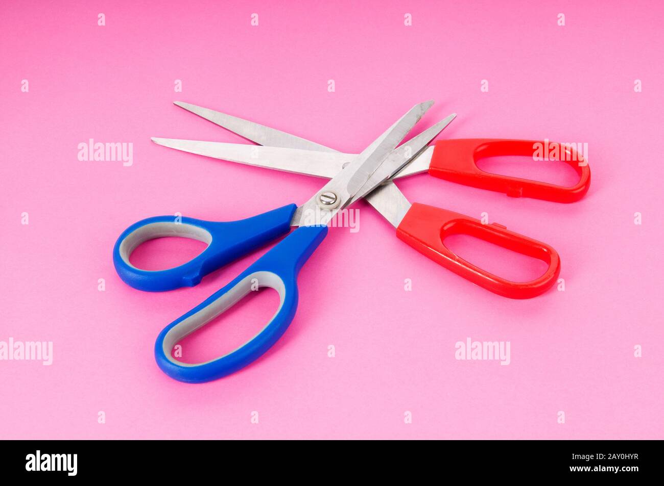Colorful scissors on the color paper background Stock Photo - Alamy