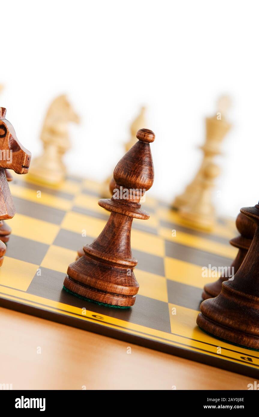 Set of chess figures on the playing board Stock Photo - Alamy