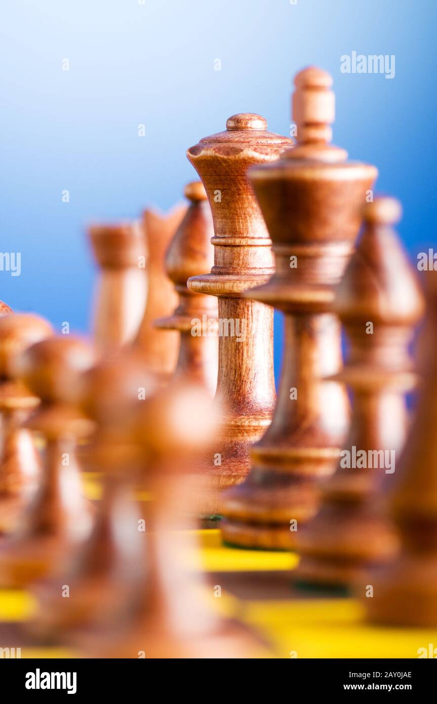 Set of chess figures on the playing board Stock Photo - Alamy