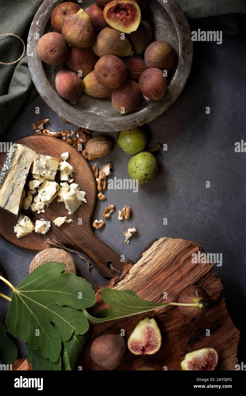 Figs, walnuts and blue cheese arrangement Stock Photo - Alamy