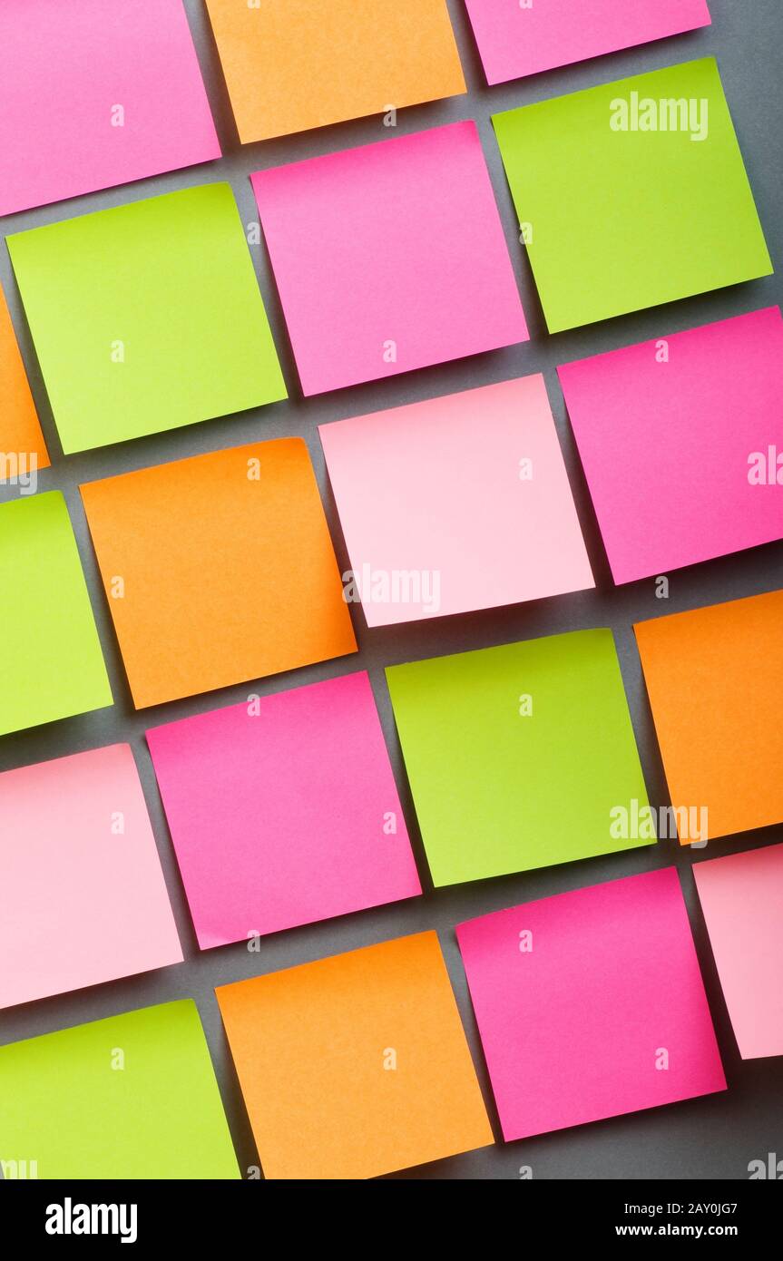 Reminder notes on the bright colorful paper Stock Photo - Alamy